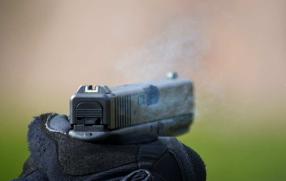 Armed bystander uses gun to save pregnant woman from 'brutal' attack