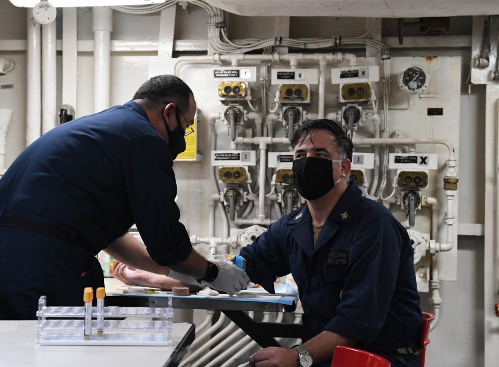 Navy considers tracking devices for personnel social distancing amid ...