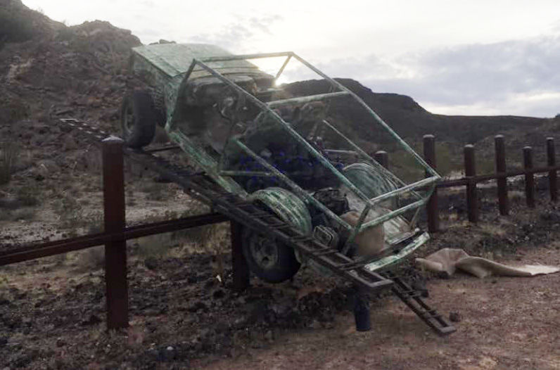 Smugglers' Jeep gets stuck atop makeshift ramp on Arizona border fence ...