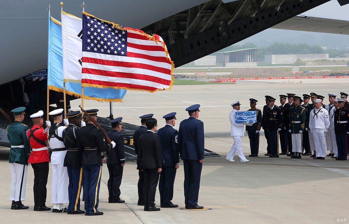 Watch the emotional return of 55 US troops' remains back to US custody ...