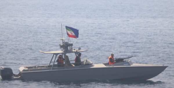 Pics: Iranian gunboat nearly collides with US warship while charging it ...