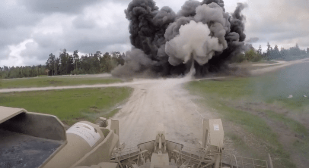 Ride GoPro first person in this Assault Breacher Vehicle as it uses explosives to blast away ...