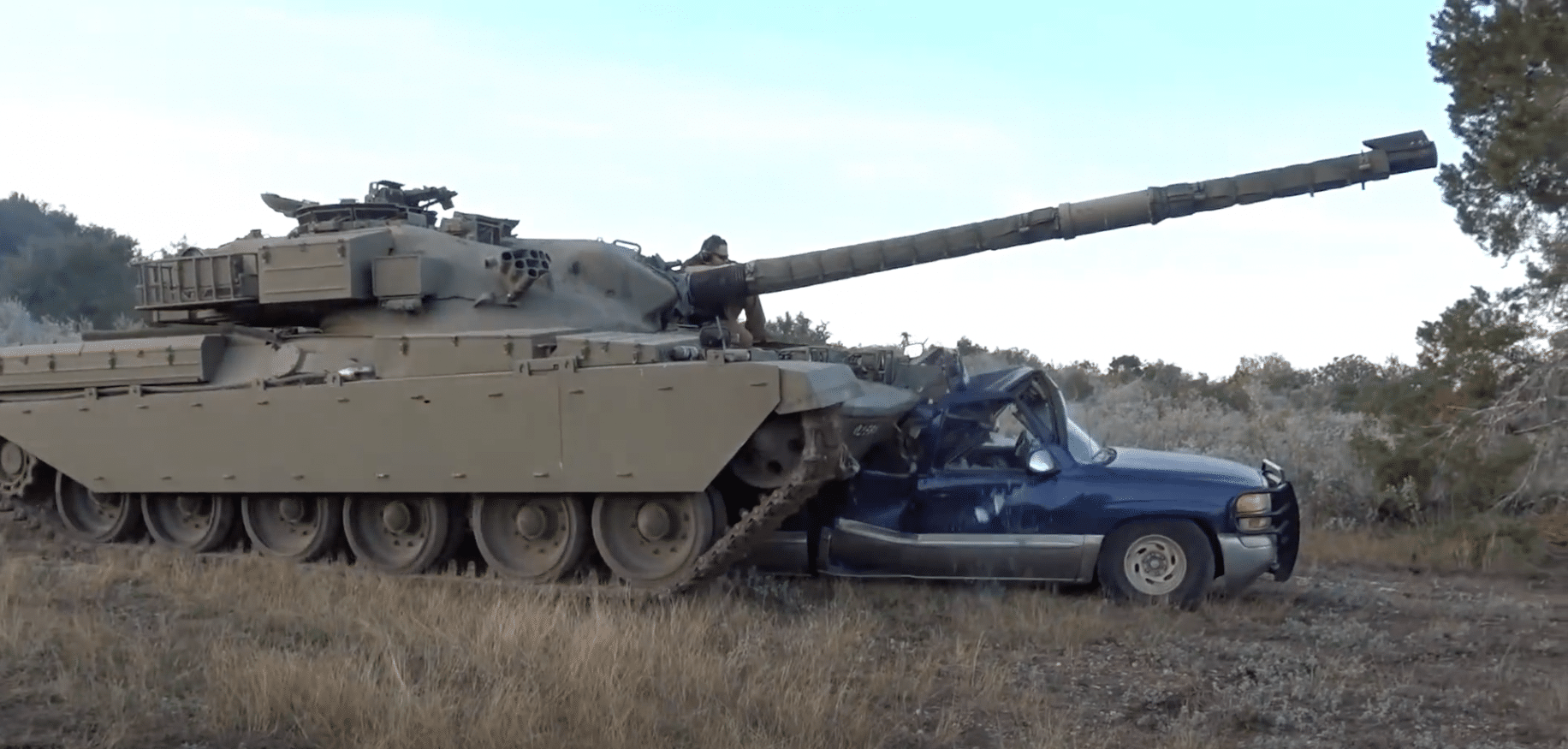 Watch this dude destroy his pickup truck with a tank | American ...