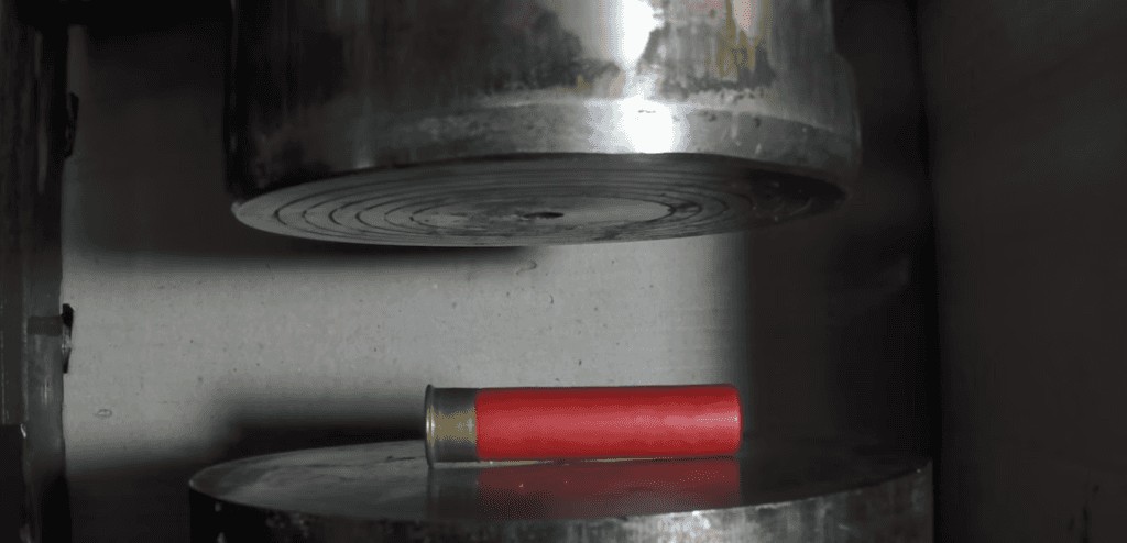 Watch what happens when a hydraulic press pulverizes live ammo ...
