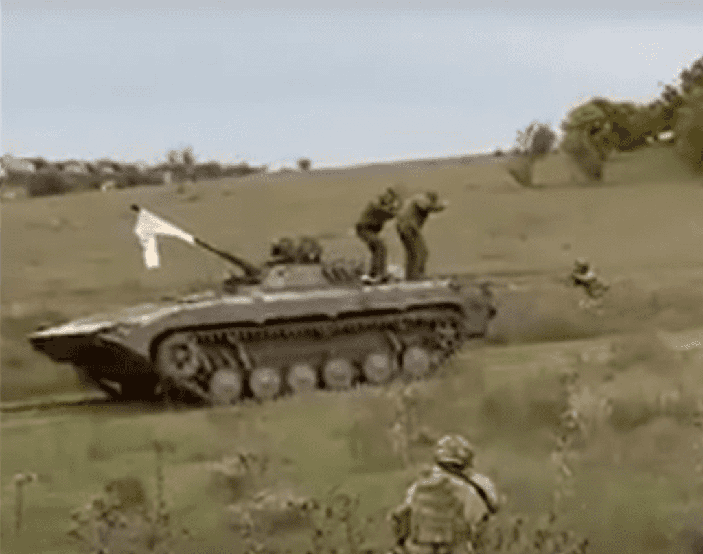 Video: Russians wave white flags from combat vehicle to surrender