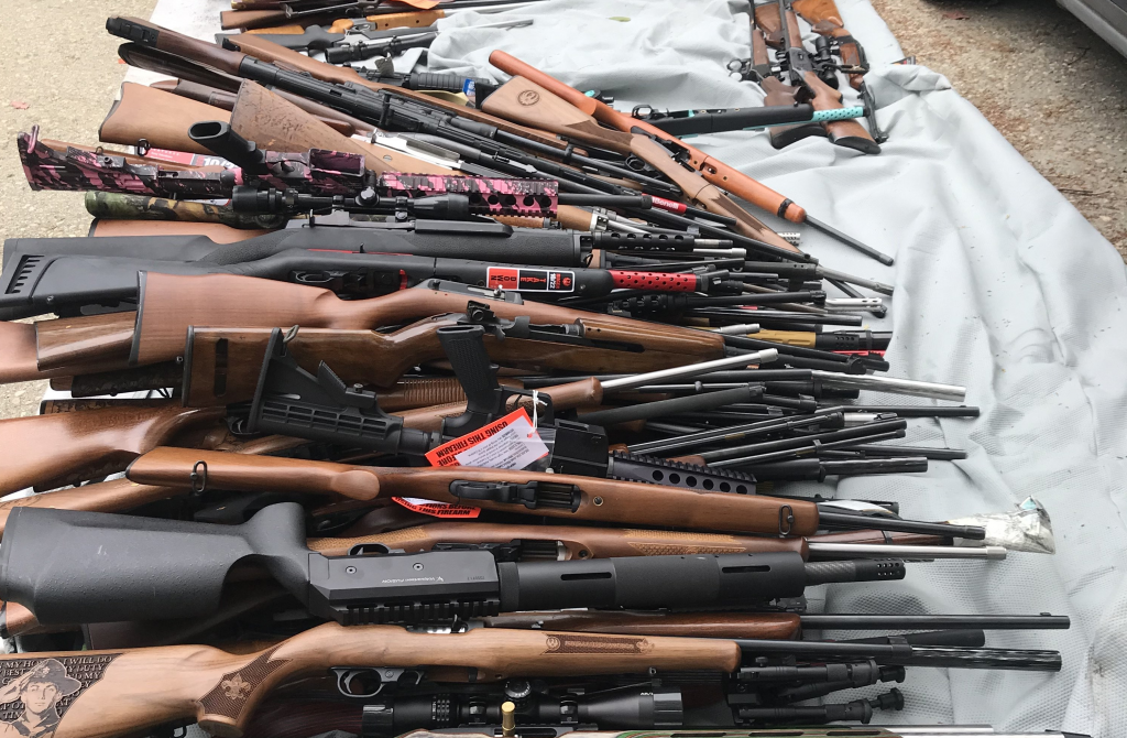 PHOTOS: Massive cache of 1,000 guns seized from Bel-Air mansion ...