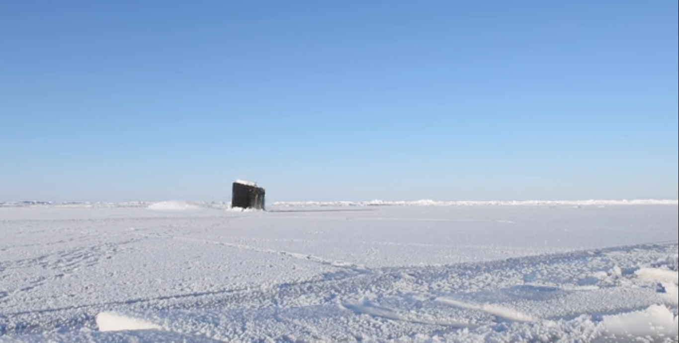 Crazy video of nuclear submarine breaking through ice in the Arctic ...