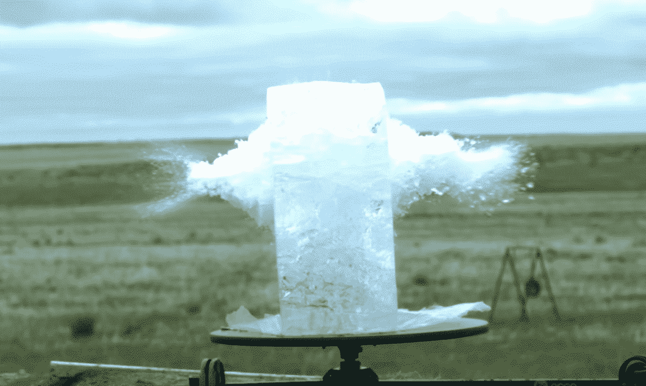 Watch Larry Vickers shoot a .50 cal at 150 pound block of ice ...