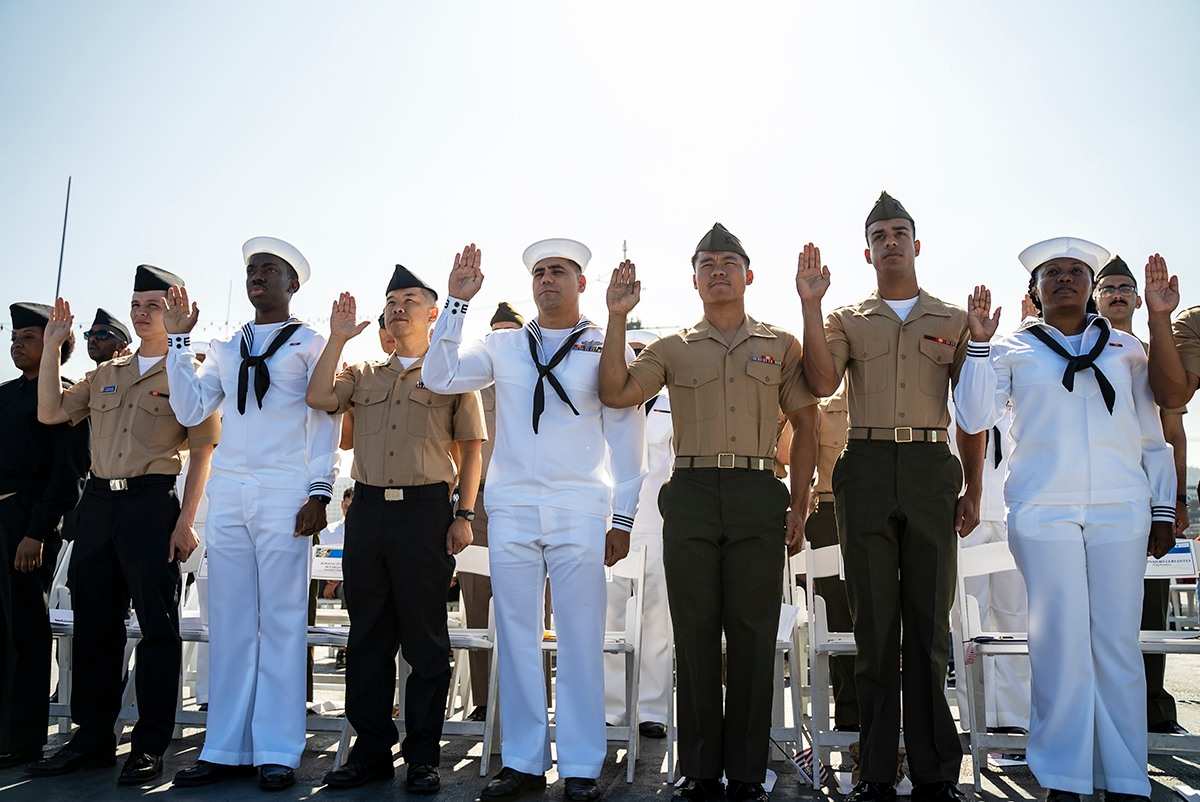 Pics: 20 US troops become American citizens aboard USS Midway Museum ...