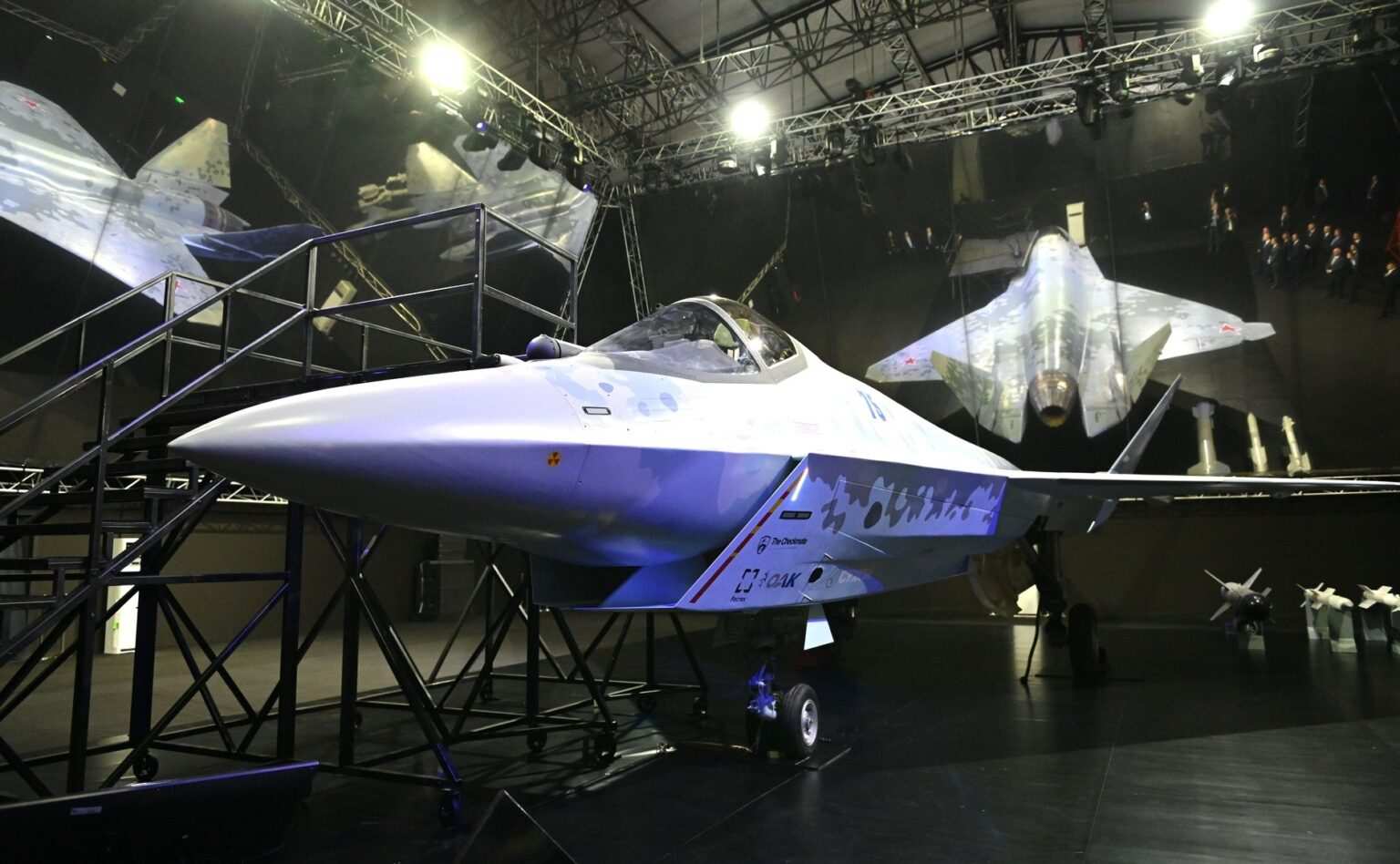 Pics: Russia unveils new stealth fighter jet it claims is capable of ...